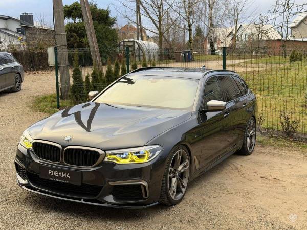 Grey BMW M550 2019 in Siauliai, with an engine capacity of 2.99 L and mileage of 114 thousand km for 29999 €, photo 7 on AUTOMOTO.COM.LV