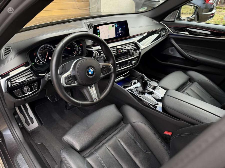 Grey BMW M550 2019 in Siauliai, with an engine capacity of 2.99 L and mileage of 114 thousand km for 29999 €, photo 9 on AUTOMOTO.COM.LV