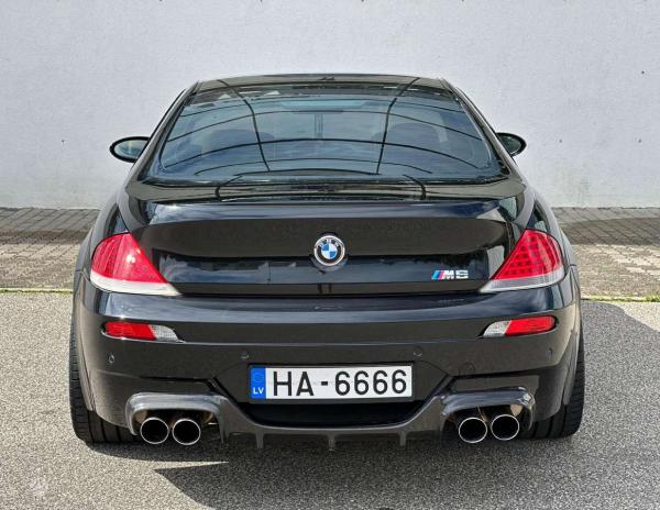 Melns BMW M6 2005 Rīga, ar dzinēja tilpumu 5.00 L un nobraukumu 132 tūkst. km par 21000 €, foto 4 vietnē AUTOMOTO.COM.LV