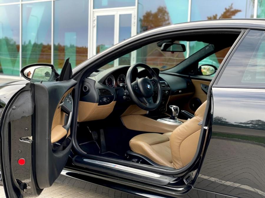 Melns BMW M6 2005 Rīga, ar dzinēja tilpumu 5.00 L un nobraukumu 129 tūkst. km par 20990 €, foto 9 vietnē AUTOMOTO.COM.LV