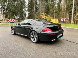 Melns BMW M6 2009 Ogre, ar dzinēja tilpumu 5.00 L un nobraukumu 130 tūkst. km par 23950 €, foto 5 vietnē AUTOMOTO.COM.LV