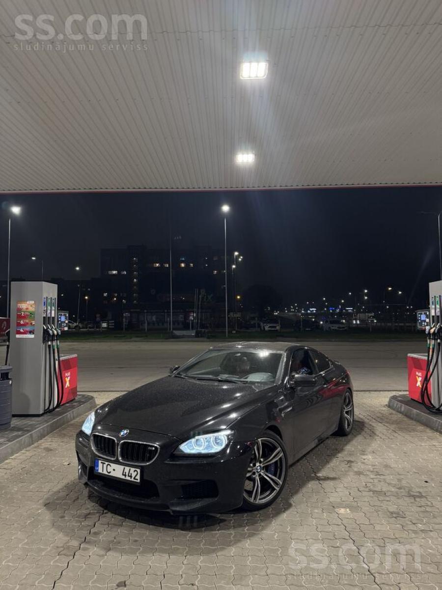 Black BMW M6 2013 in Riga, with an engine capacity of 4.40 L and mileage of 118 thousand km for 39999 €, photo 7 on AUTOMOTO.COM.LV
