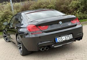 Black BMW M6 2014 in Riga, with an engine capacity of 4.40 L and mileage of 182 thousand km for 24500 €, photo 12 on AUTOMOTO.COM.LV