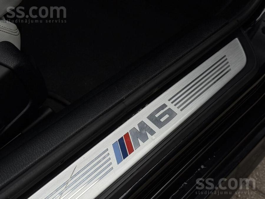Black BMW M6 2014 in Riga, with an engine capacity of 4.40 L and mileage of 182 thousand km for 24500 €, photo 18 on AUTOMOTO.COM.LV