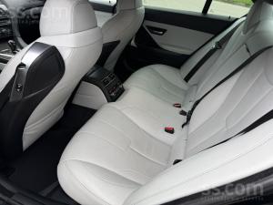 Black BMW M6 2014 in Riga, with an engine capacity of 4.40 L and mileage of 182 thousand km for 24500 €, photo 19 on AUTOMOTO.COM.LV