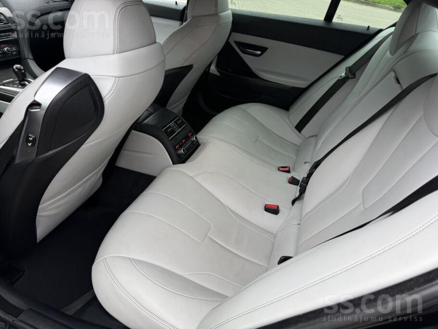 Black BMW M6 2014 in Riga, with an engine capacity of 4.40 L and mileage of 182 thousand km for 24500 €, photo 19 on AUTOMOTO.COM.LV