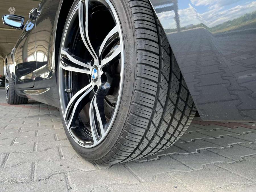 Grey BMW M6 2014 in Vilnius, with an engine capacity of 4.40 L and mileage of 110 thousand km for 28990 €, photo 28 on AUTOMOTO.COM.LV