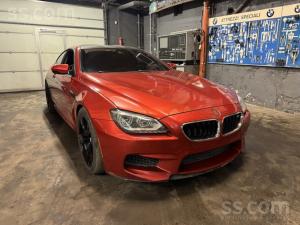 Orange BMW M6 2013 in Riga, with an engine capacity of 4.40 L and mileage of 206 thousand km for 22000 €, photo 8 on AUTOMOTO.COM.LV