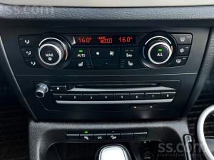 Black BMW X1 2009 in Riga, with an engine capacity of 2.00 L and mileage of 225 thousand km for 7700 €, photo 11 on AUTOMOTO.COM.LV