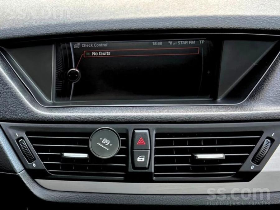 Black BMW X1 2009 in Riga, with an engine capacity of 2.00 L and mileage of 225 thousand km for 7700 €, photo 13 on AUTOMOTO.COM.LV