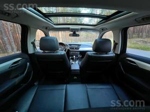 Black BMW X1 2009 in Riga, with an engine capacity of 2.00 L and mileage of 225 thousand km for 7300 €, photo 8 on AUTOMOTO.COM.LV