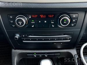 Black BMW X1 2009 in Riga, with an engine capacity of 2.00 L and mileage of 225 thousand km for 7300 €, photo 12 on AUTOMOTO.COM.LV