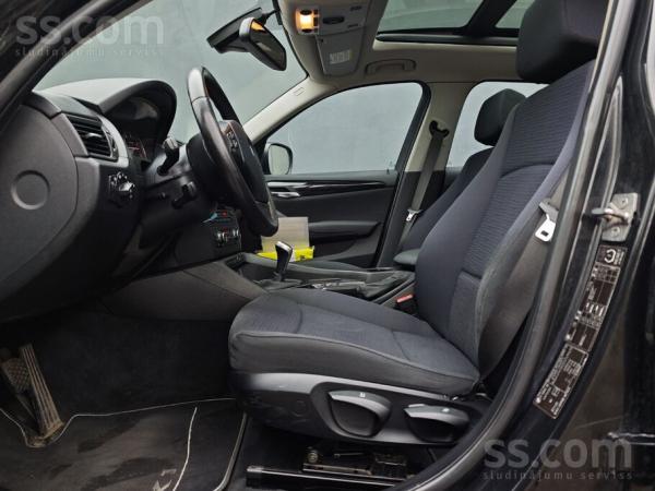 Black BMW X1 2010 in Ogre, with an engine capacity of 2.00 L and mileage of 269 thousand km for 5275 €, photo 7 on AUTOMOTO.COM.LV