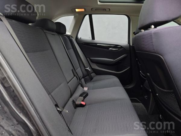 Black BMW X1 2010 in Ogre, with an engine capacity of 2.00 L and mileage of 269 thousand km for 5275 €, photo 10 on AUTOMOTO.COM.LV