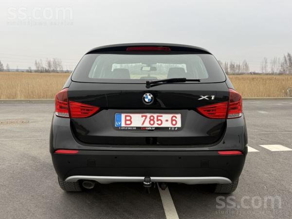 Black BMW X1 2010 in Liepaja, with an engine capacity of 2.00 L and mileage of 212 thousand km for 7400 €, photo 8 on AUTOMOTO.COM.LV