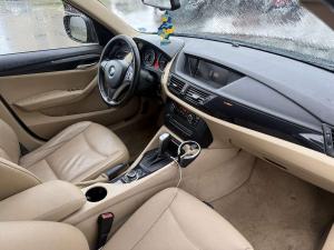 Black BMW X1 2010 in Vilnius, with an engine capacity of 2.00 L and mileage of 290 thousand km for 5500 €, photo 21 on AUTOMOTO.COM.LV
