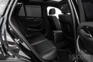 Black BMW X1 2010 in Riga, with an engine capacity of 2.00 L and mileage of 276 thousand km for 8250 €, photo 12 on AUTOMOTO.COM.LV