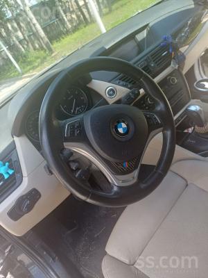 Black BMW X1 2010 in Riga, with an engine capacity of 2.00 L and mileage of 221 thousand km for 7800 €, photo 4 on AUTOMOTO.COM.LV