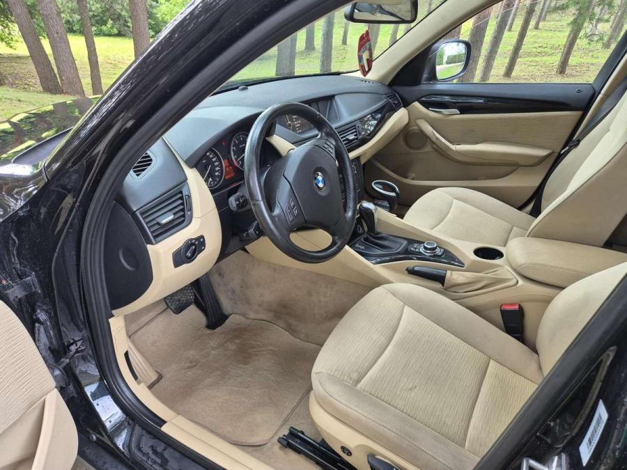 Black BMW X1 2010 in Utena, with an engine capacity of 3.00 L and mileage of 290 thousand km for 3490 €, photo 11 on AUTOMOTO.COM.LV