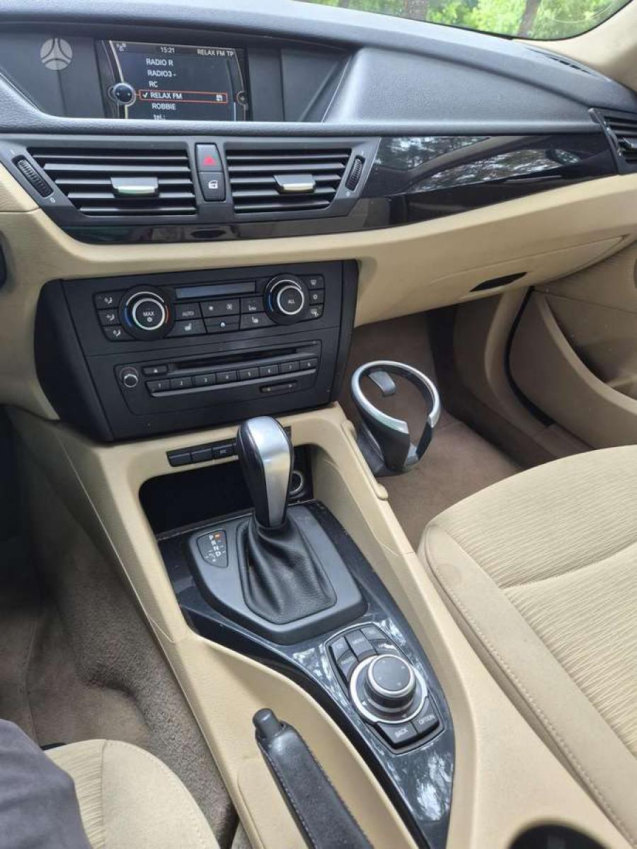Black BMW X1 2010 in Utena, with an engine capacity of 3.00 L and mileage of 290 thousand km for 3490 €, photo 16 on AUTOMOTO.COM.LV