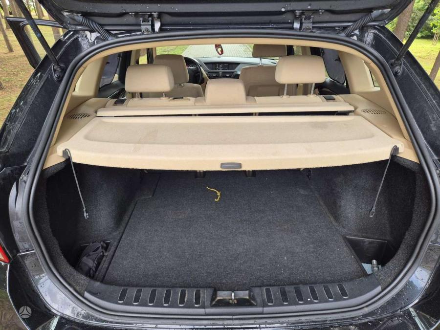 Black BMW X1 2010 in Utena, with an engine capacity of 3.00 L and mileage of 290 thousand km for 3490 €, photo 18 on AUTOMOTO.COM.LV