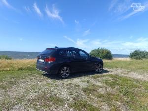 Black BMW X1 2010 in Vilnius, with an engine capacity of 2.00 L and mileage of 230 thousand km for 5300 €, photo 5 on AUTOMOTO.COM.LV