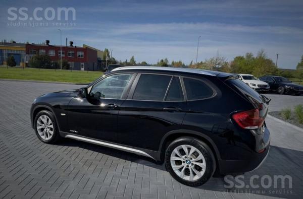Black BMW X1 2011 in Telschi, with an engine capacity of 2.00 L and mileage of 231 thousand km for 6299 €, photo 6 on AUTOMOTO.COM.LV