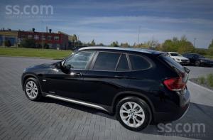 Black BMW X1 2011 in Telschi, with an engine capacity of 2.00 L and mileage of 231 thousand km for 6299 €, photo 6 on AUTOMOTO.COM.LV