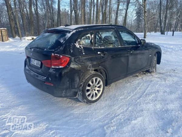 Black BMW X1 2011 in Prienai, with an engine capacity of 2.00 L and mileage of 296 thousand km for 5500 €, photo 5 on AUTOMOTO.COM.LV