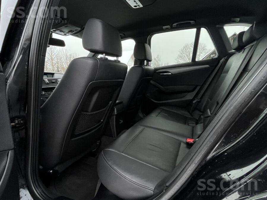 Black BMW X1 2011 in Gulbene, with an engine capacity of 2.00 L and mileage of 0 thousand km for 9990 €, photo 12 on AUTOMOTO.COM.LV