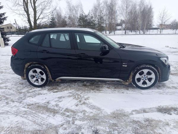 Black BMW X1 2011 in Marijampole, with an engine capacity of 2.00 L and mileage of 260 thousand km for 6300 €, photo 5 on AUTOMOTO.COM.LV