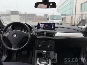 Black BMW X1 2011 in Riga, with an engine capacity of 2.00 L and mileage of 0 thousand km for 14600 €, photo 4 on AUTOMOTO.COM.LV