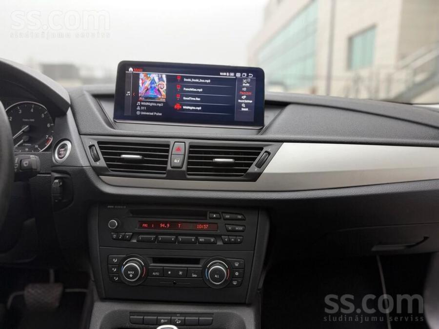 Black BMW X1 2011 in Riga, with an engine capacity of 2.00 L and mileage of 0 thousand km for 14600 €, photo 7 on AUTOMOTO.COM.LV