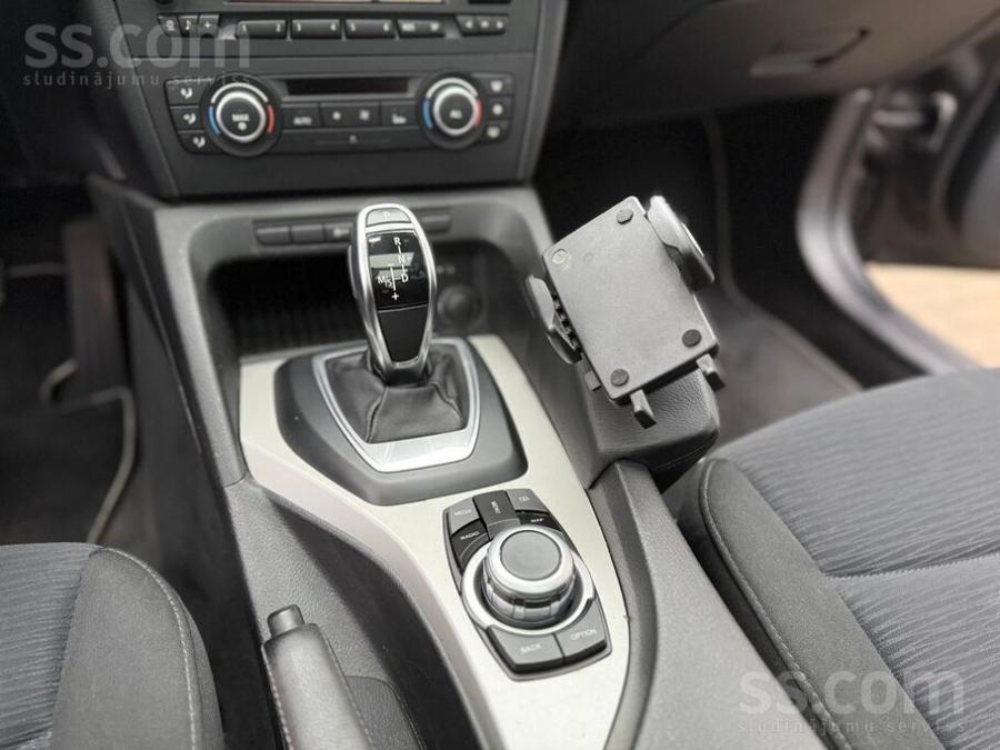 Black BMW X1 2011 in Riga, with an engine capacity of 2.00 L and mileage of 0 thousand km for 14600 €, photo 8 on AUTOMOTO.COM.LV