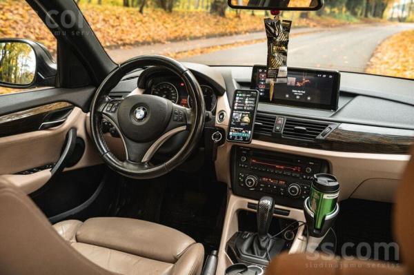 Black BMW X1 2011 in Riga, with an engine capacity of 2.30 L and mileage of 285 thousand km for 8700 €, photo 8 on AUTOMOTO.COM.LV