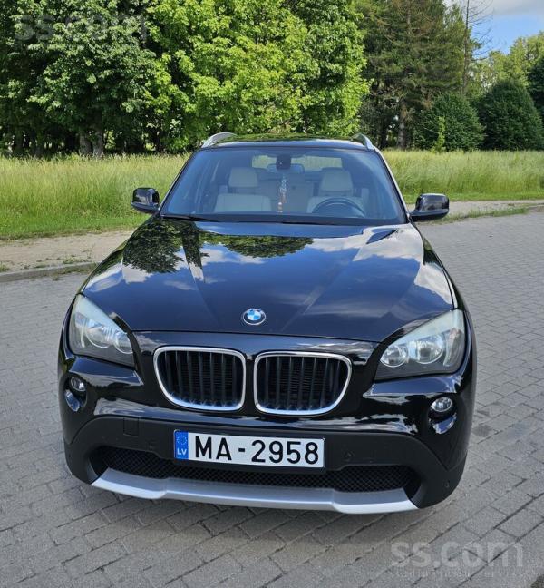 Black BMW X1 2011 in Tukums, with an engine capacity of 2.00 L and mileage of 328 thousand km for 8300 €, photo 2 on AUTOMOTO.COM.LV