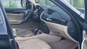 Black BMW X1 2011 in Vilnius, with an engine capacity of 2.00 L and mileage of 217 thousand km for 5450 €, photo 6 on AUTOMOTO.COM.LV