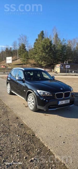 Black BMW X1 2011 in Madona, with an engine capacity of 2.00 L and mileage of 254 thousand km for 8300 €, photo 11 on AUTOMOTO.COM.LV