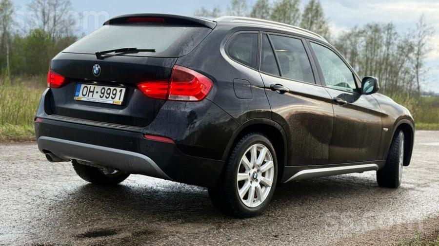 Black BMW X1 2011 in Madona, with an engine capacity of 2.00 L and mileage of 254 thousand km for 8300 €, photo 12 on AUTOMOTO.COM.LV