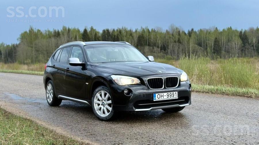 Black BMW X1 2011 in Madona, with an engine capacity of 2.00 L and mileage of 254 thousand km for 8300 €, photo 15 on AUTOMOTO.COM.LV