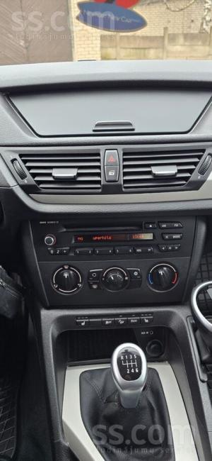 Black BMW X1 2011 in Madona, with an engine capacity of 2.00 L and mileage of 254 thousand km for 8300 €, photo 16 on AUTOMOTO.COM.LV