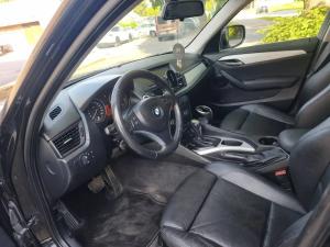 Black BMW X1 2011 in Cesis, with an engine capacity of 2.00 L and mileage of 262 thousand km for 6900 €, photo 13 on AUTOMOTO.COM.LV