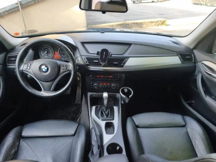 Black BMW X1 2011 in Cesis, with an engine capacity of 2.00 L and mileage of 262 thousand km for 6900 €, photo 14 on AUTOMOTO.COM.LV