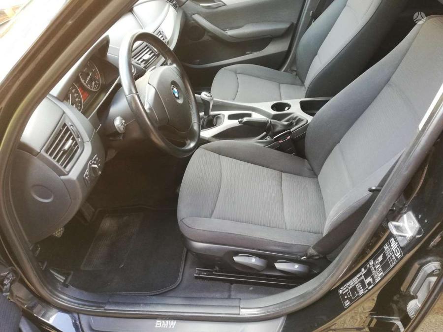 Black BMW X1 2011 in Rokiskis, with an engine capacity of 2.00 L and mileage of 182 thousand km for 4999 €, photo 15 on AUTOMOTO.COM.LV