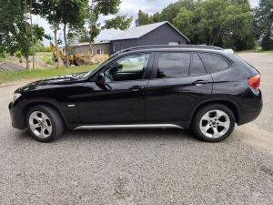 Black BMW X1 2011 in Raseiniai, with an engine capacity of 2.00 L and mileage of 196 thousand km for 6800 €, photo  on AUTOMOTO.COM.LV