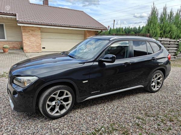 Black BMW X1 2011 in Kaunas, with an engine capacity of 2.00 L and mileage of 215 thousand km for 7600 €, photo 5 on AUTOMOTO.COM.LV