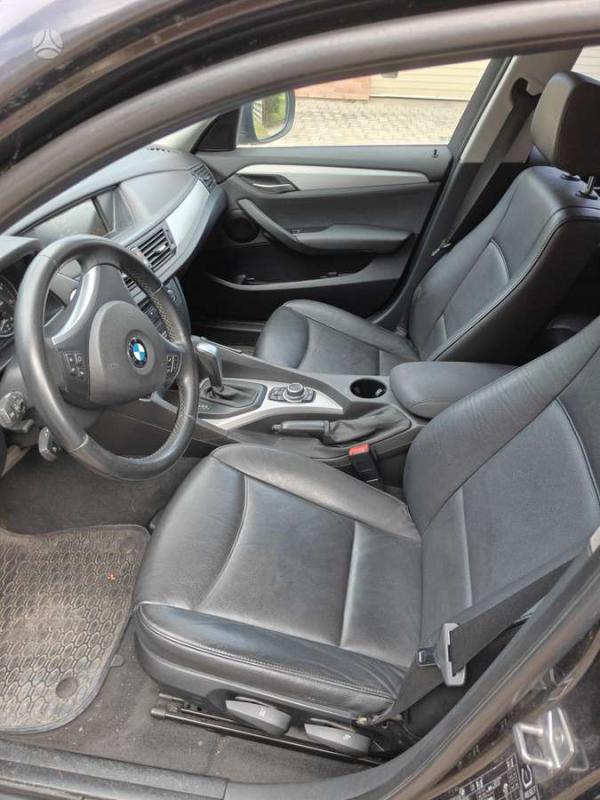 Black BMW X1 2011 in Kaunas, with an engine capacity of 2.00 L and mileage of 215 thousand km for 7600 €, photo 7 on AUTOMOTO.COM.LV