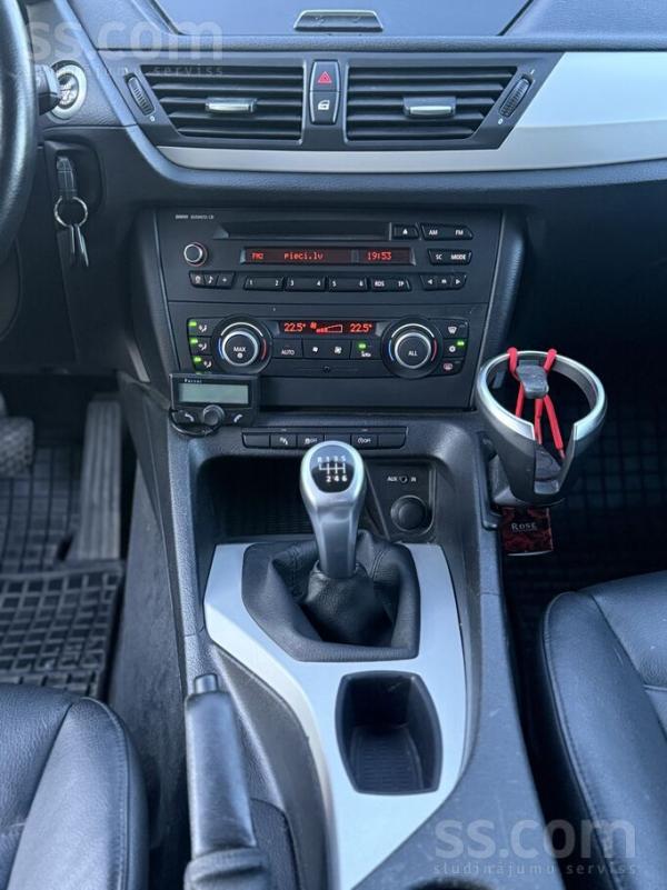 Black BMW X1 2011 in Tukums, with an engine capacity of 2.00 L and mileage of 333 thousand km for 6750 €, photo 11 on AUTOMOTO.COM.LV