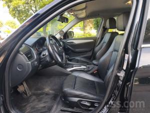 Black BMW X1 2011 in Cesis, with an engine capacity of 2.00 L and mileage of 262 thousand km for 6900 €, photo 12 on AUTOMOTO.COM.LV