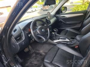 Black BMW X1 2011 in Cesis, with an engine capacity of 2.00 L and mileage of 262 thousand km for 6900 €, photo 13 on AUTOMOTO.COM.LV